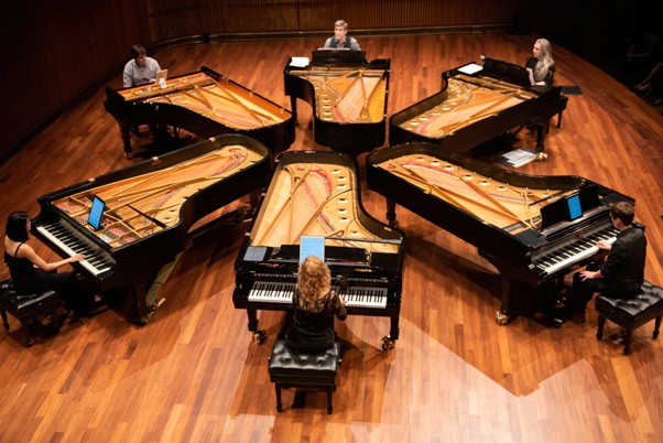 No other instruments needed as six-piano Grand Band creates a big sound ...
